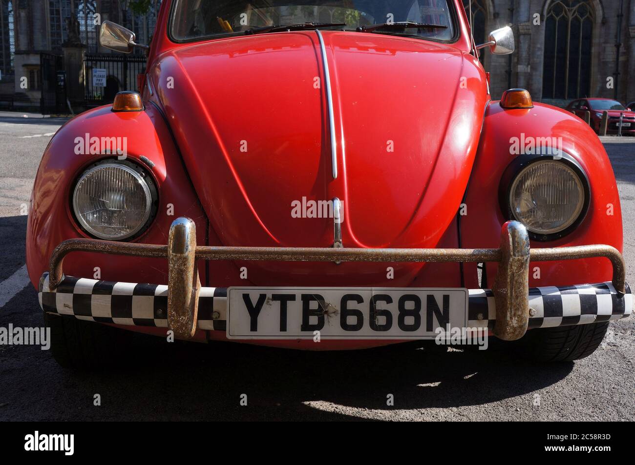 front view of a red Volkswagen beetle in a carpark Stock Photo - Alamy