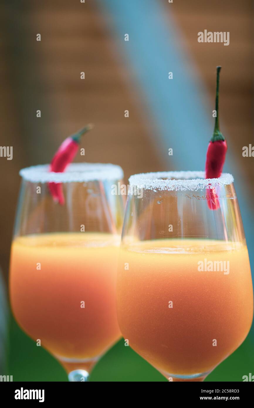 Glass of mango chilli martini or cocktail Stock Photo - Alamy