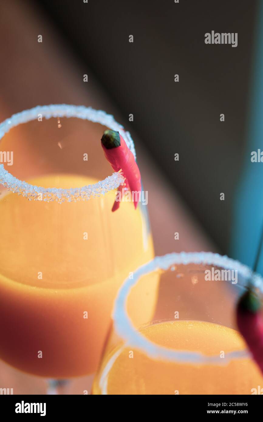 Glass of mango chilli martini or cocktail Stock Photo - Alamy
