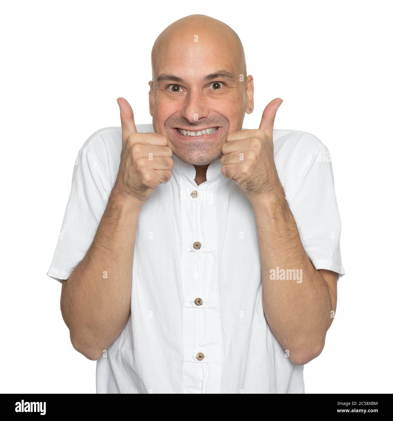 Happy bald man in casual white shirt is showing thumbs up. Isolated ...