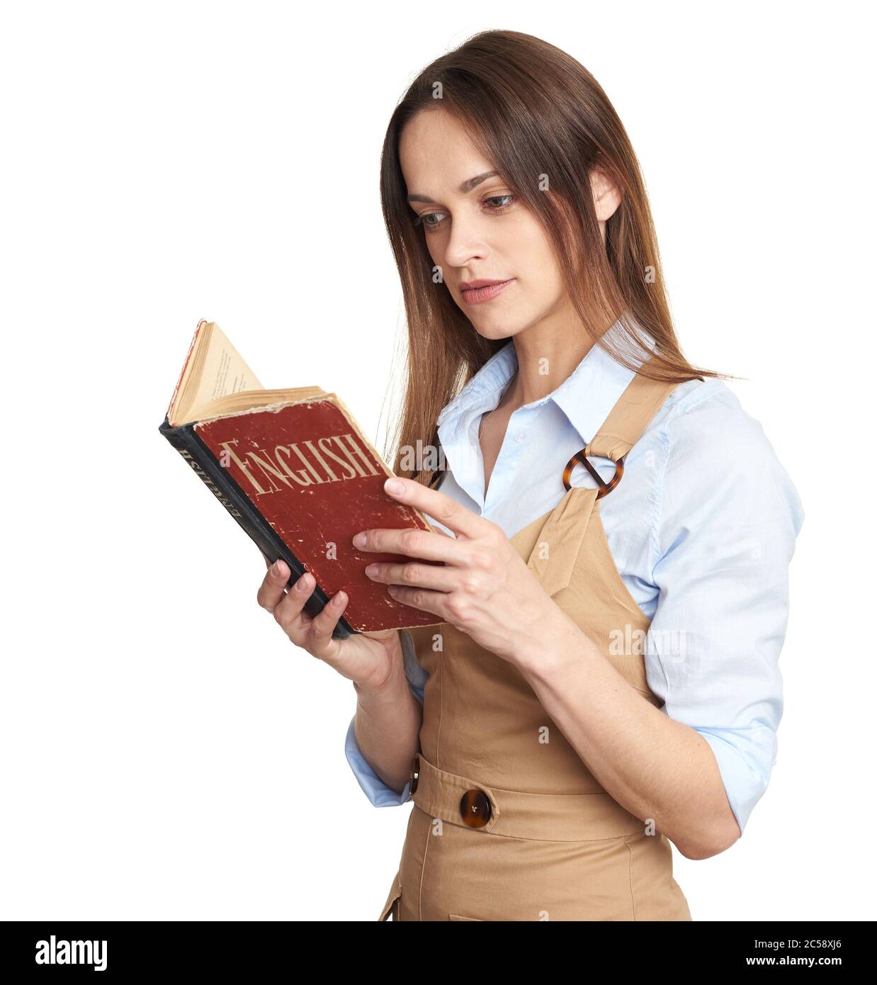 Happy young woman is learning english. Isolated on white Stock Photo ...