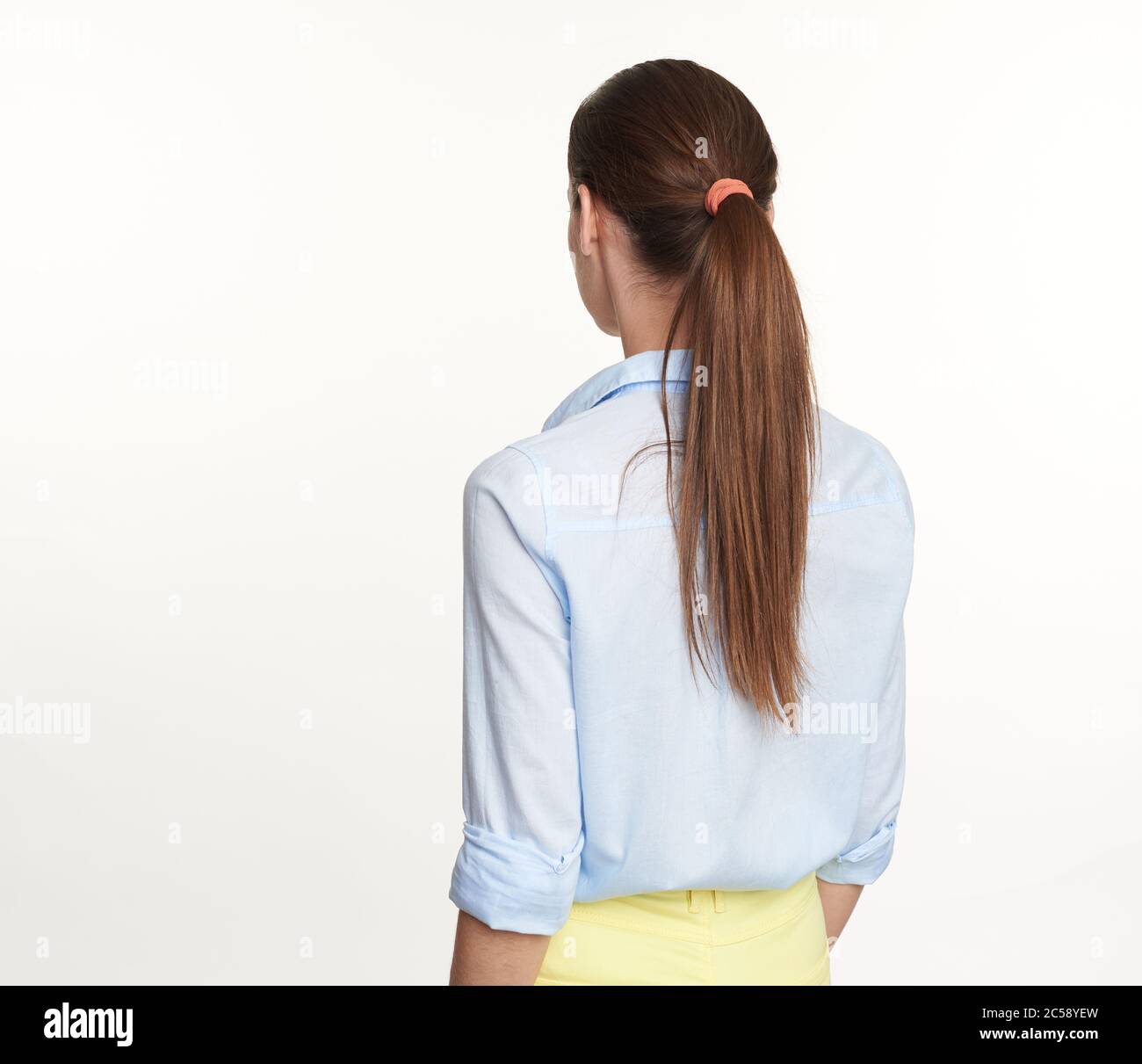 Woman with ponytail hair style rear view isolated on white Stock Photo ...