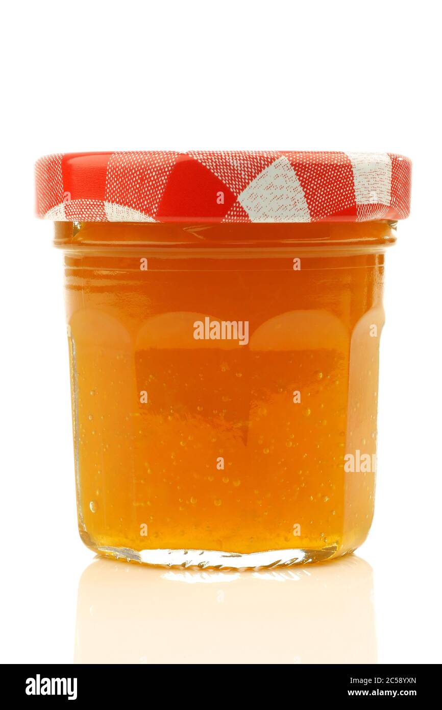 glass jar with fruit jam with room for your label, text or images on a ...