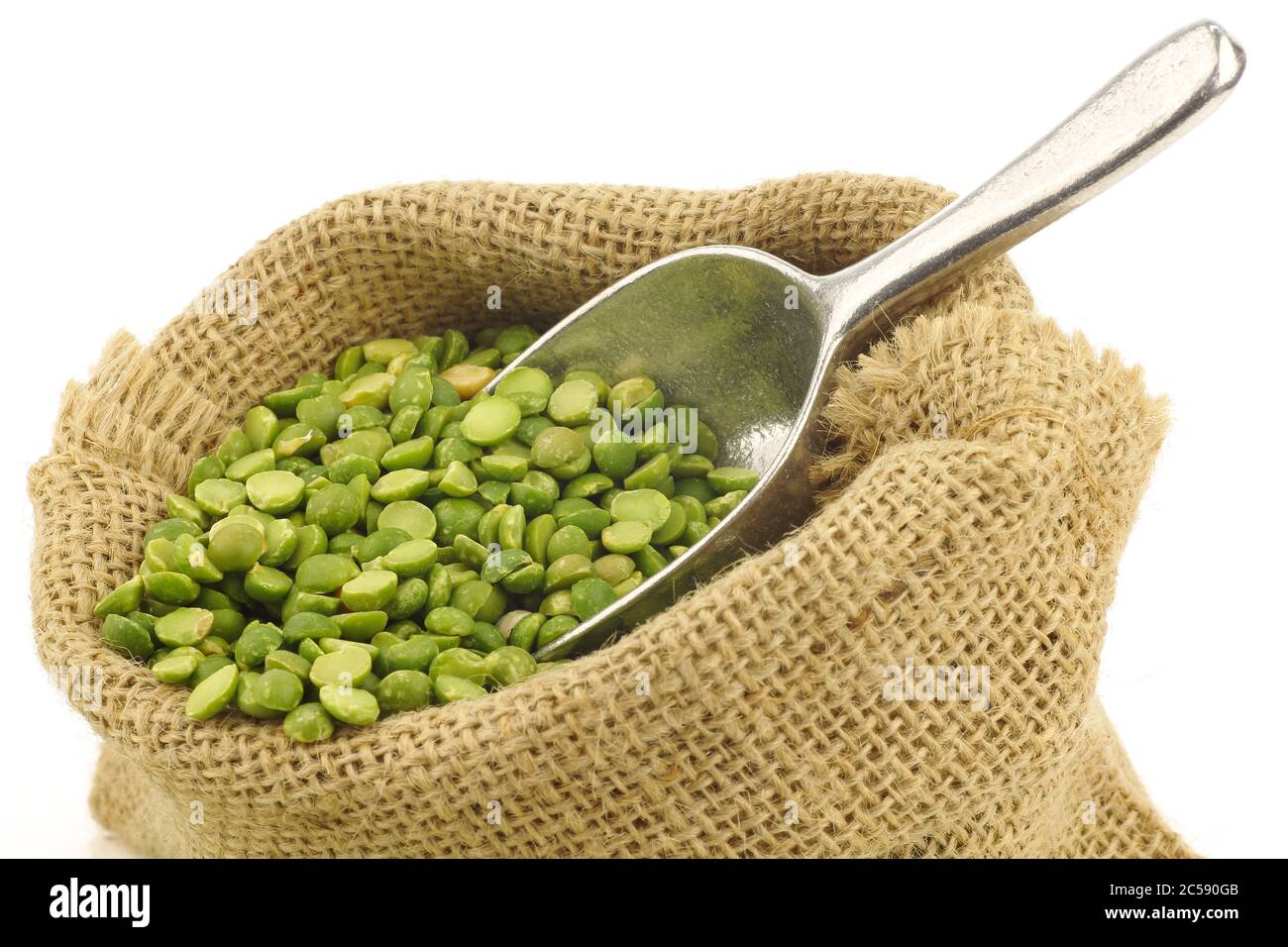 split green peas in a burlap bag on a white background Stock Photo - Alamy