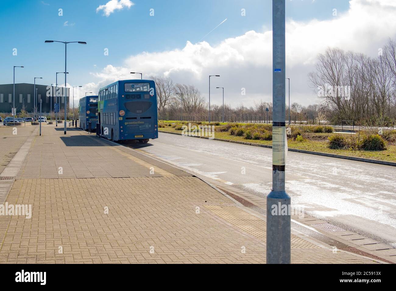Pair of buses seen parked up at a Park and Ride destination. The guided ...