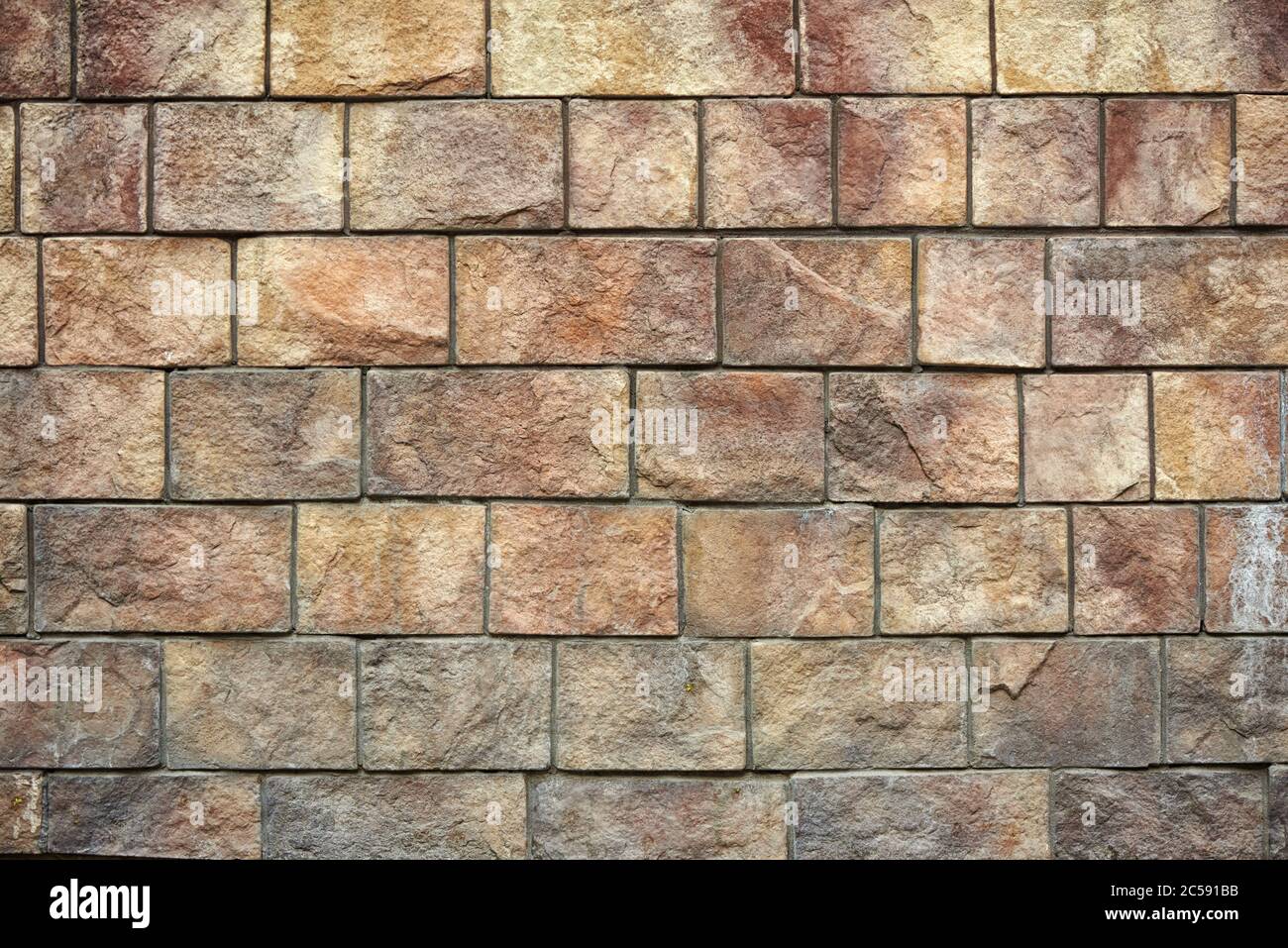 Natural stone brick wall texture background Stock Photo - Alamy