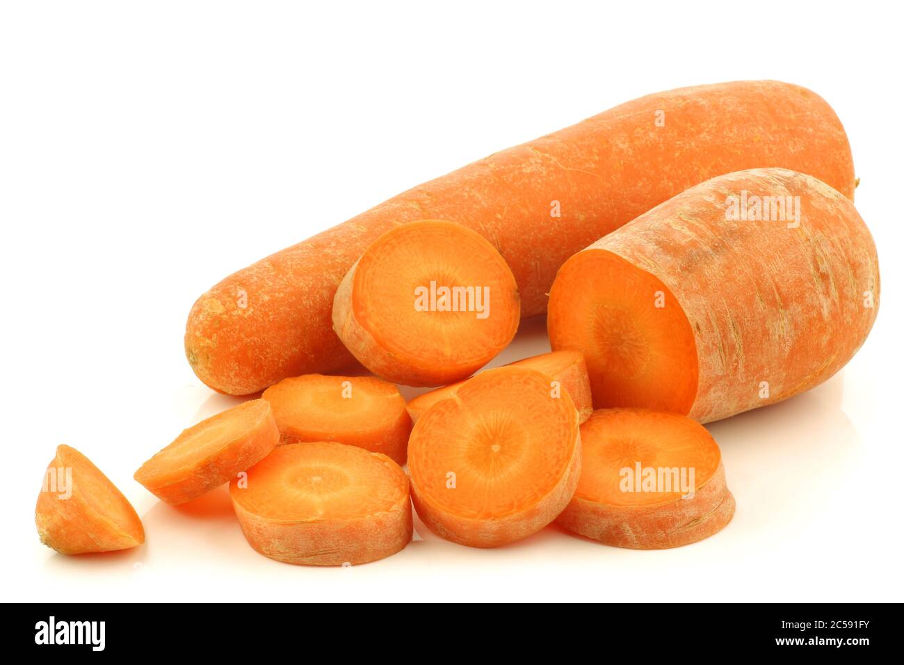 Winter carrots on a white background Stock Photo - Alamy
