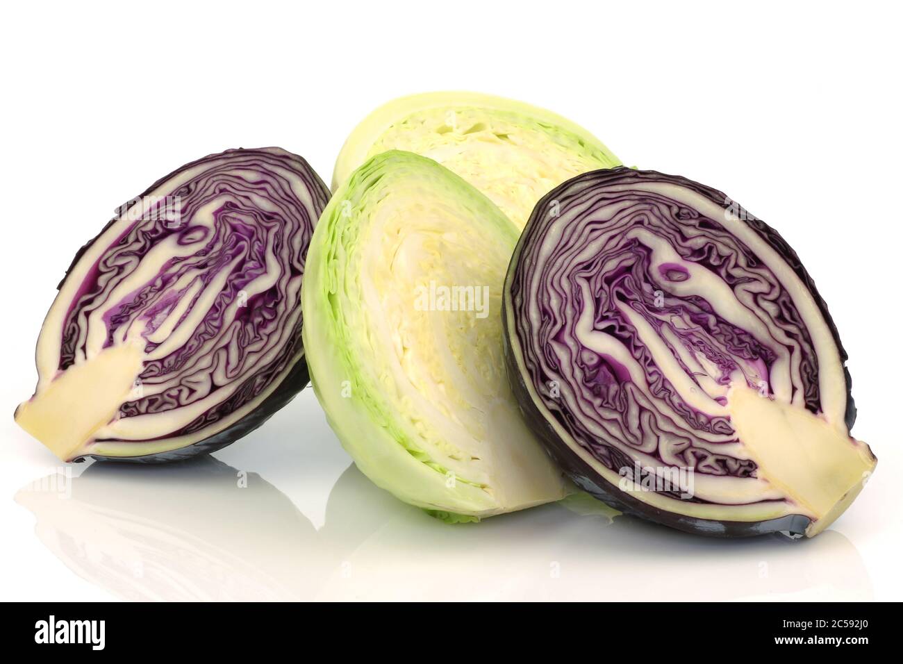 red and white cut cabbage on a white background Stock Photo - Alamy