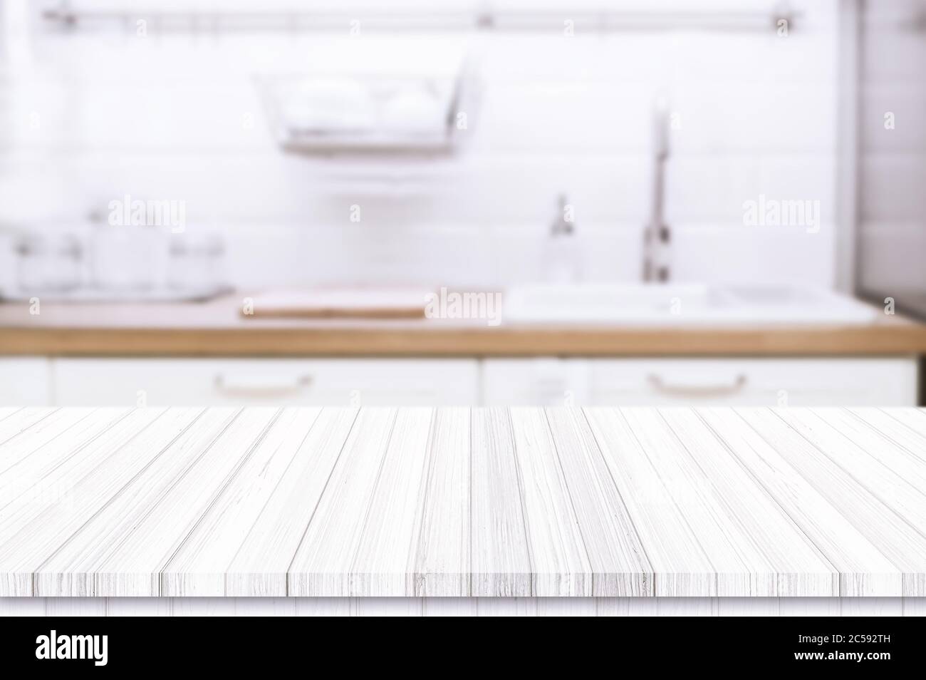Wood table top on blurred kitchen background Stock Photo - Alamy