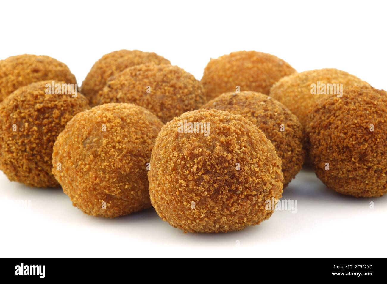 a real traditional Dutch snack called "bitterballen" on a white ...