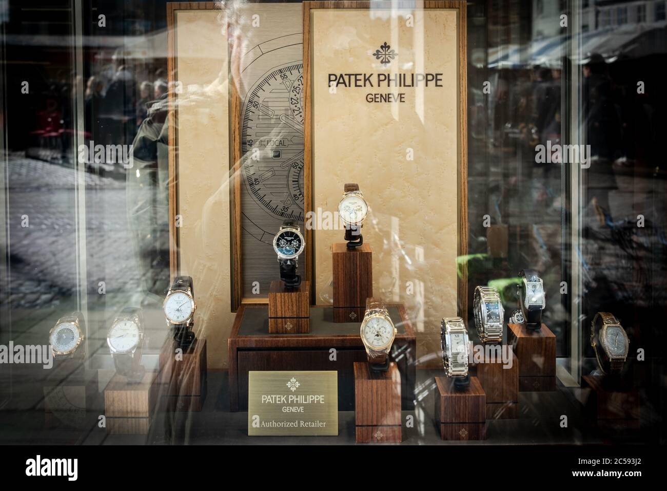 Jewellery window display of expensive, swiss made analogue watches in ...