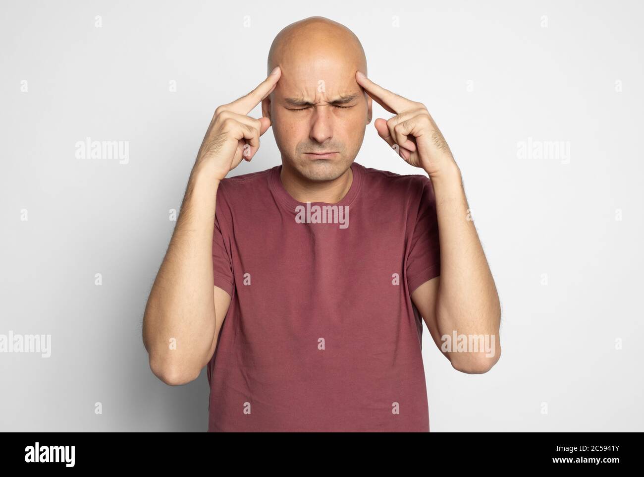 Fingers to temple hi-res stock photography and images - Alamy