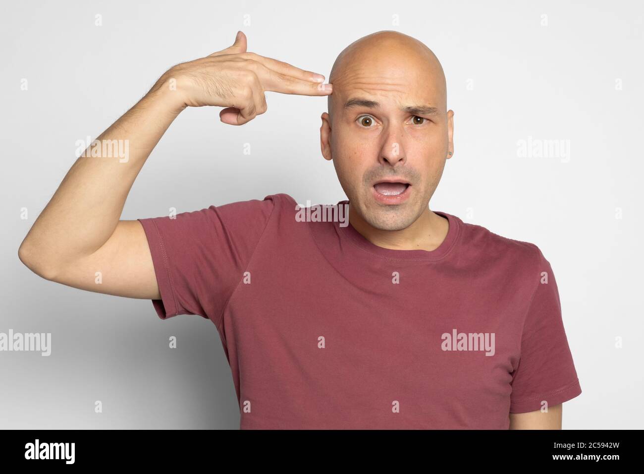 Man pointing gun at head hi-res stock photography and images - Alamy