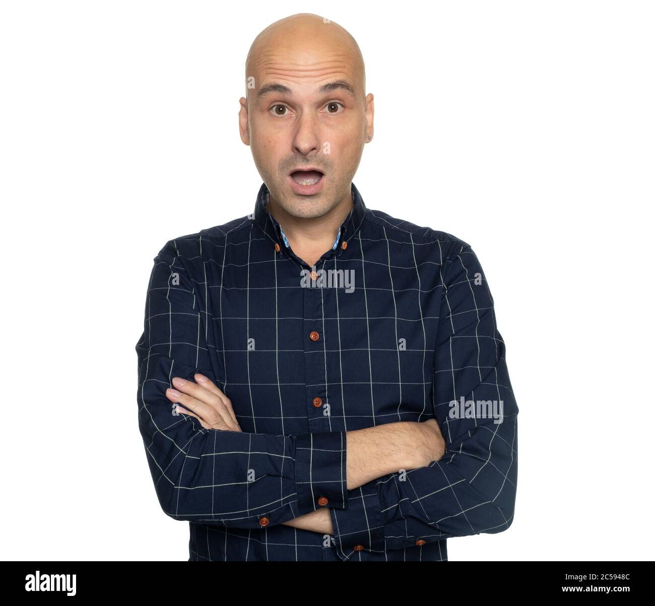 Surprised bald man standing over white studio background with mouth ...