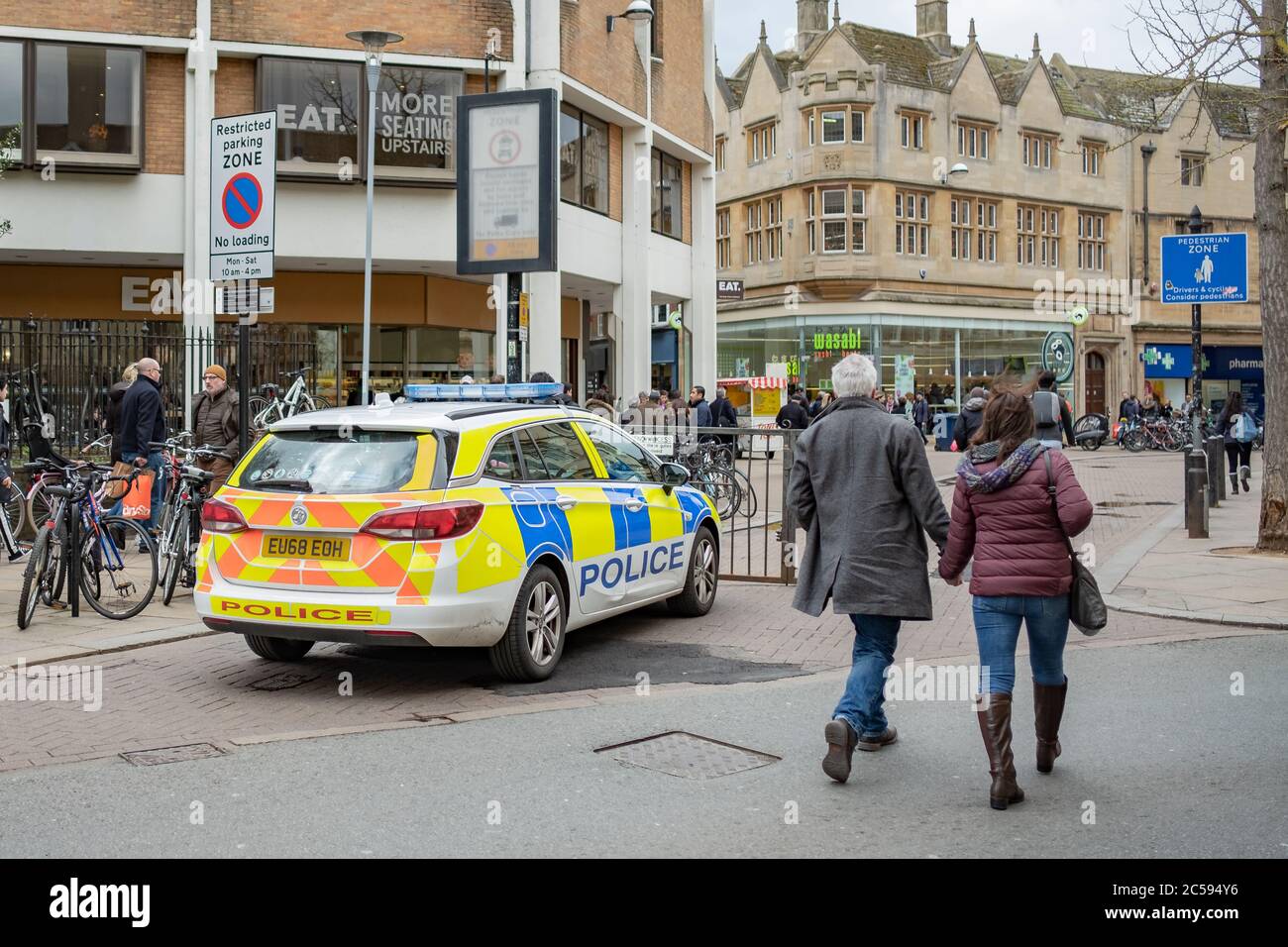 Police emergency response vehicle seen parked near a busy Saturday ...