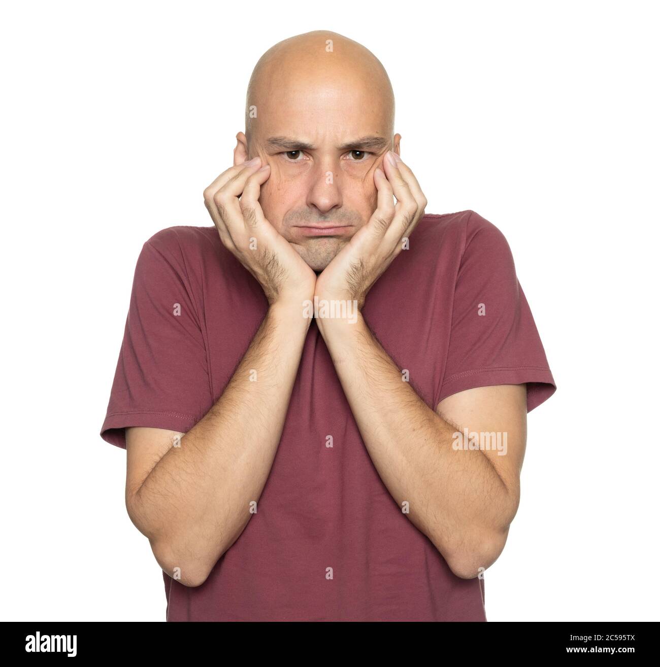 serious bald man isolated on white background Stock Photo - Alamy