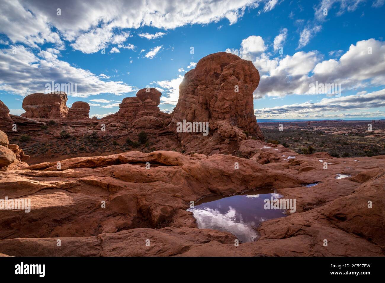 Gorgeous view atop of Turret Arch surrounded by tall sandstone spires ...