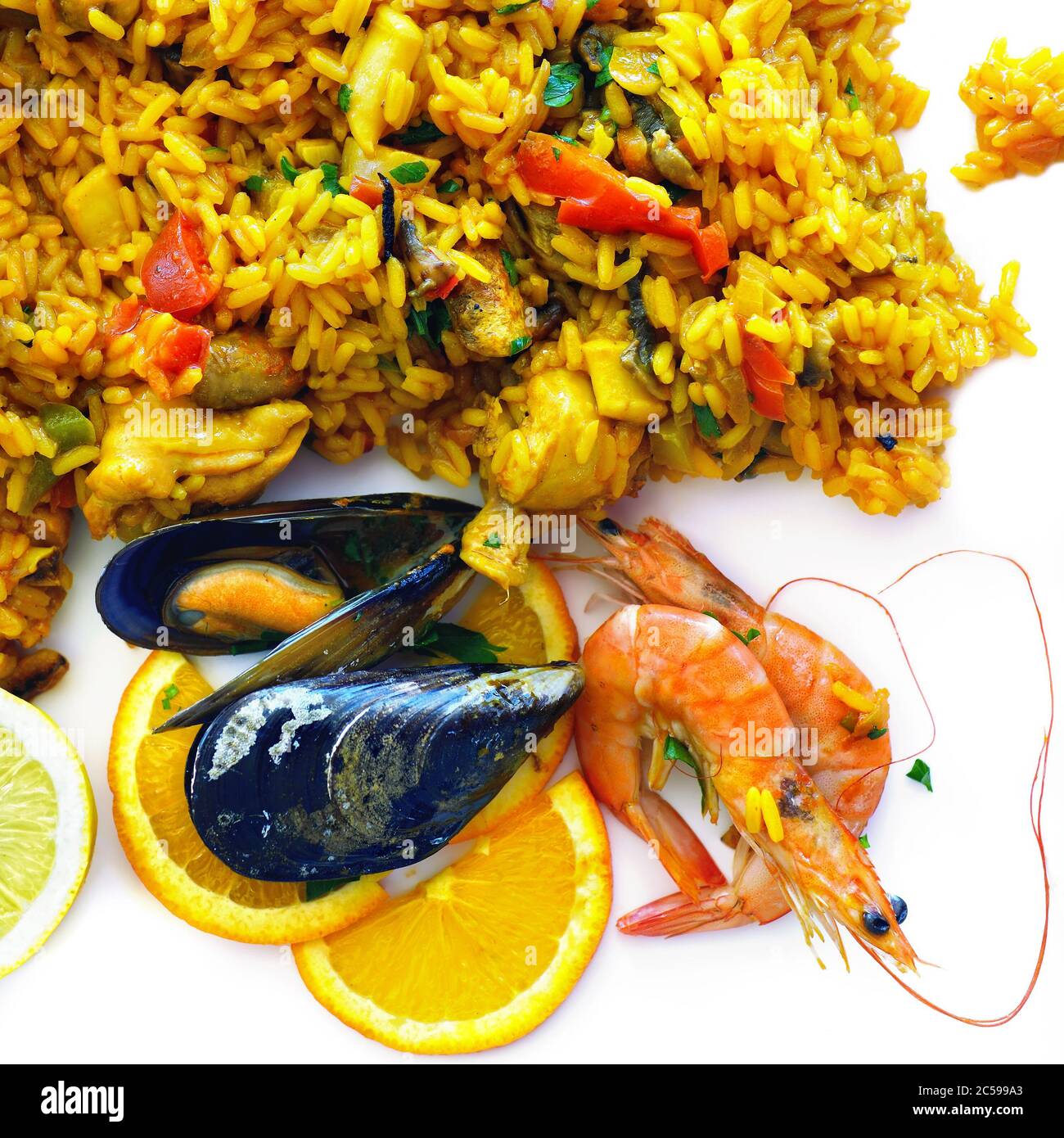 Traditional spanish seafood paella rice on the plate Stock Photo - Alamy