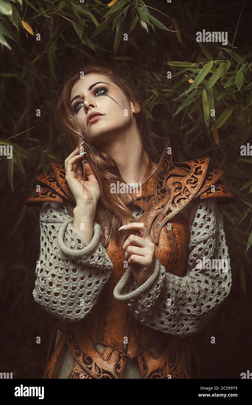 Beautiful medieval woman posing Stock Photo - Alamy