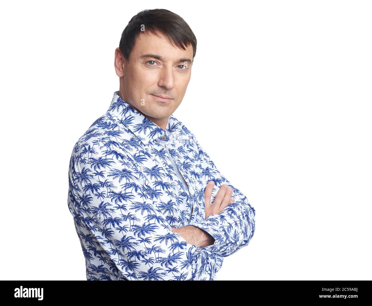 Handsome 40 years man standing with crossed arms isolated on white ...