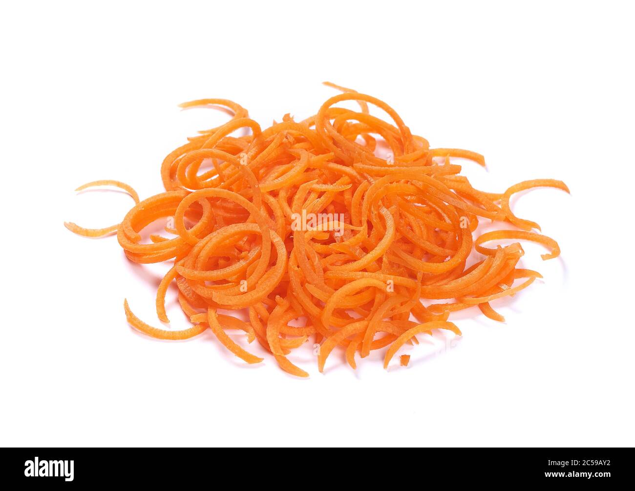 grated carrot isolated on a white background Stock Photo - Alamy