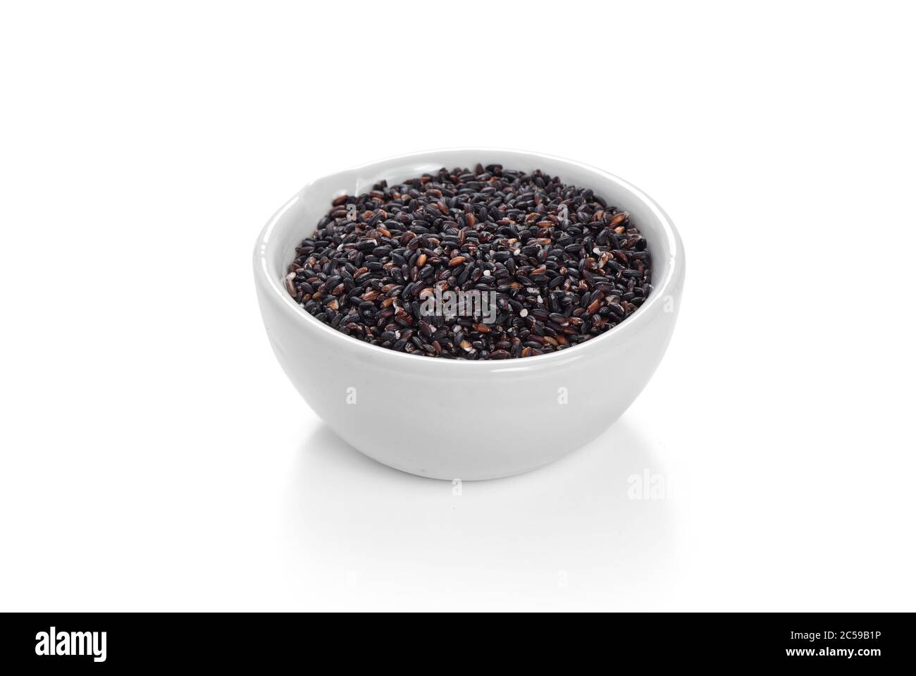 Wild rice in a bowl isolated on white background Stock Photo - Alamy