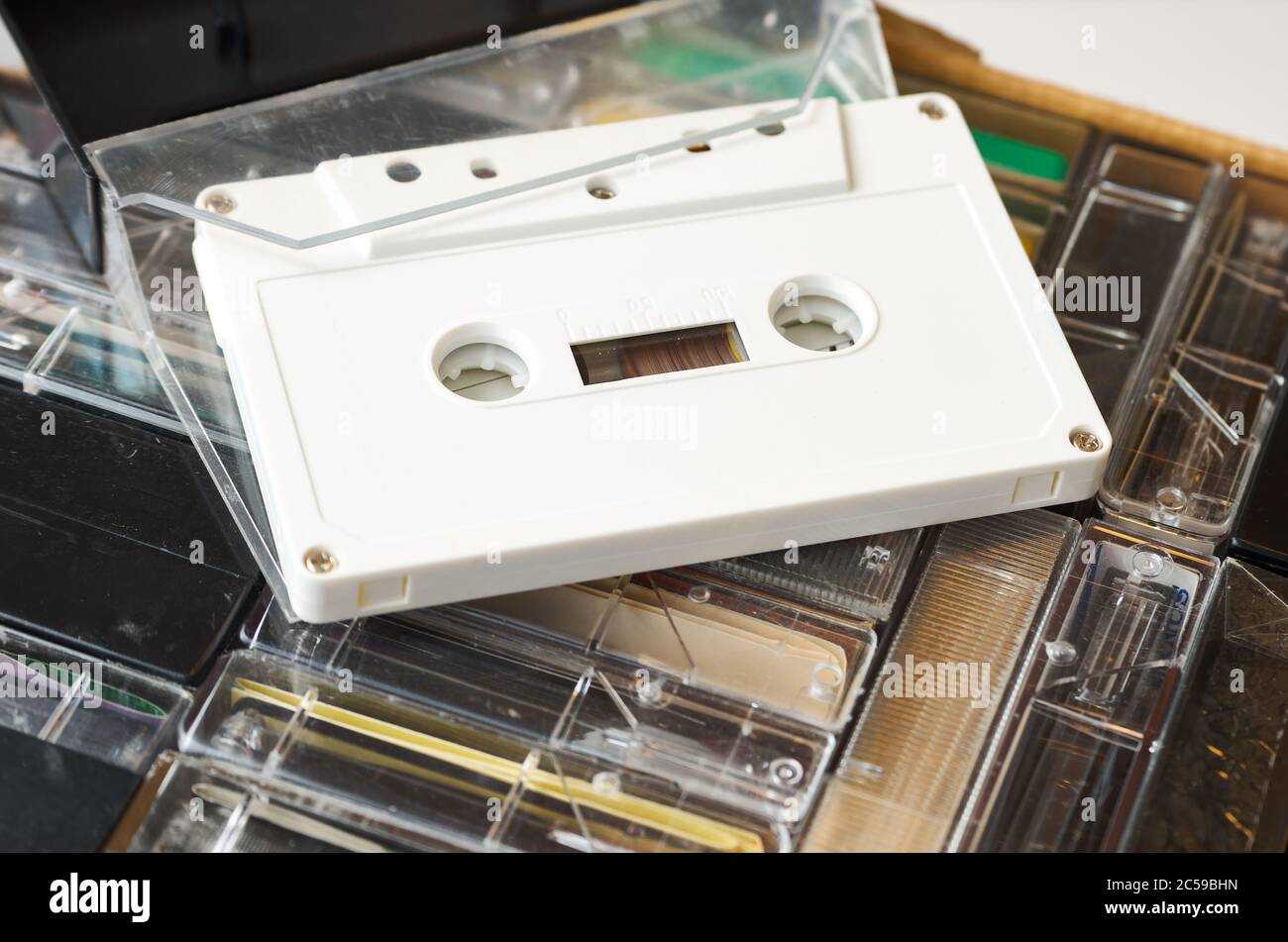 Single white audio cassette without markings on top of the box with ...