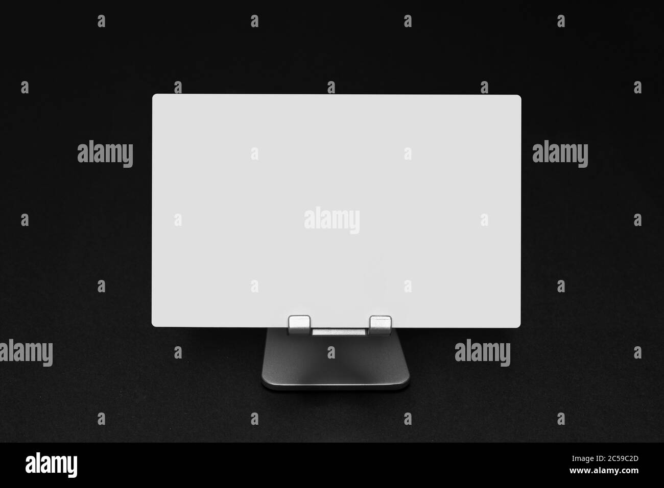 blank white paper sheet on a stand with copy space Stock Photo - Alamy