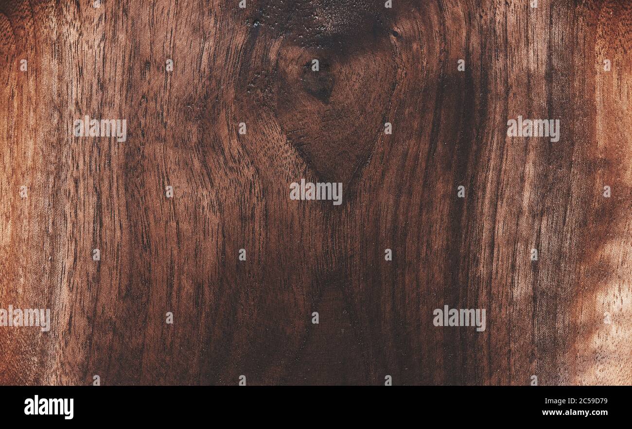 walnut background. Texture of dark wood Stock Photo - Alamy