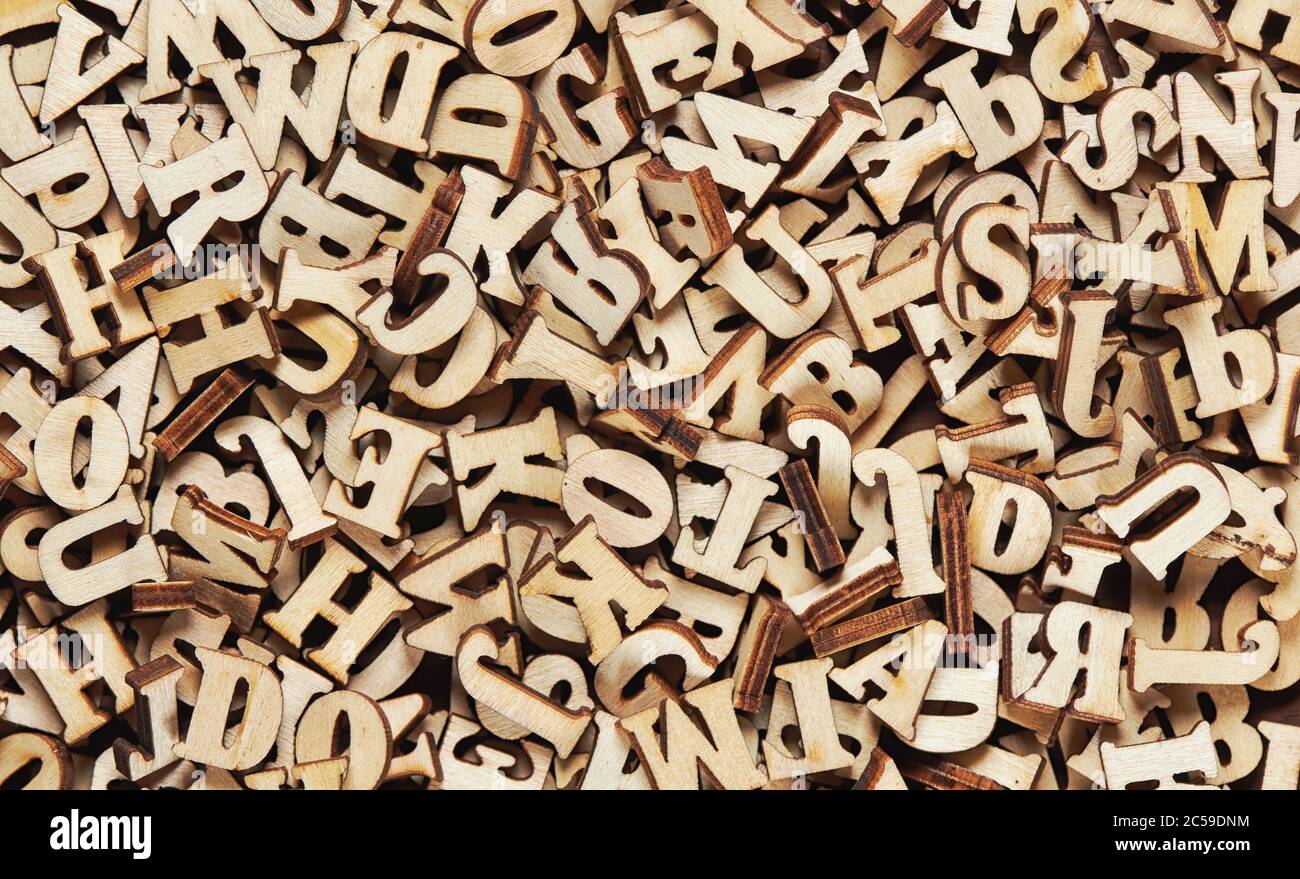 heap of wooden english letters top view Stock Photo - Alamy