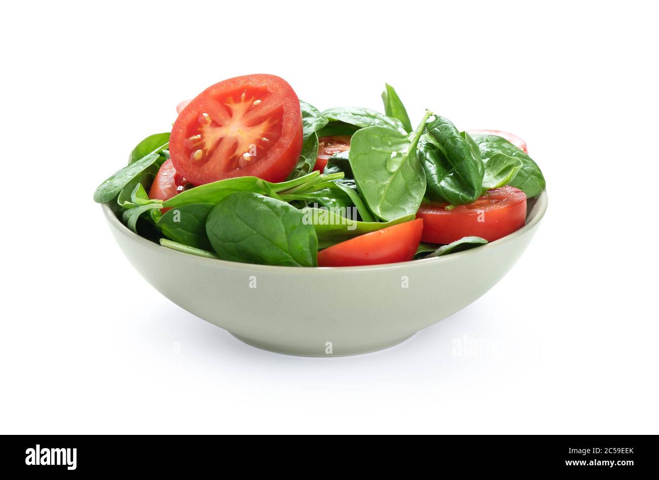 Bowl of mixed salad isolated Cut Out Stock Images & Pictures - Alamy