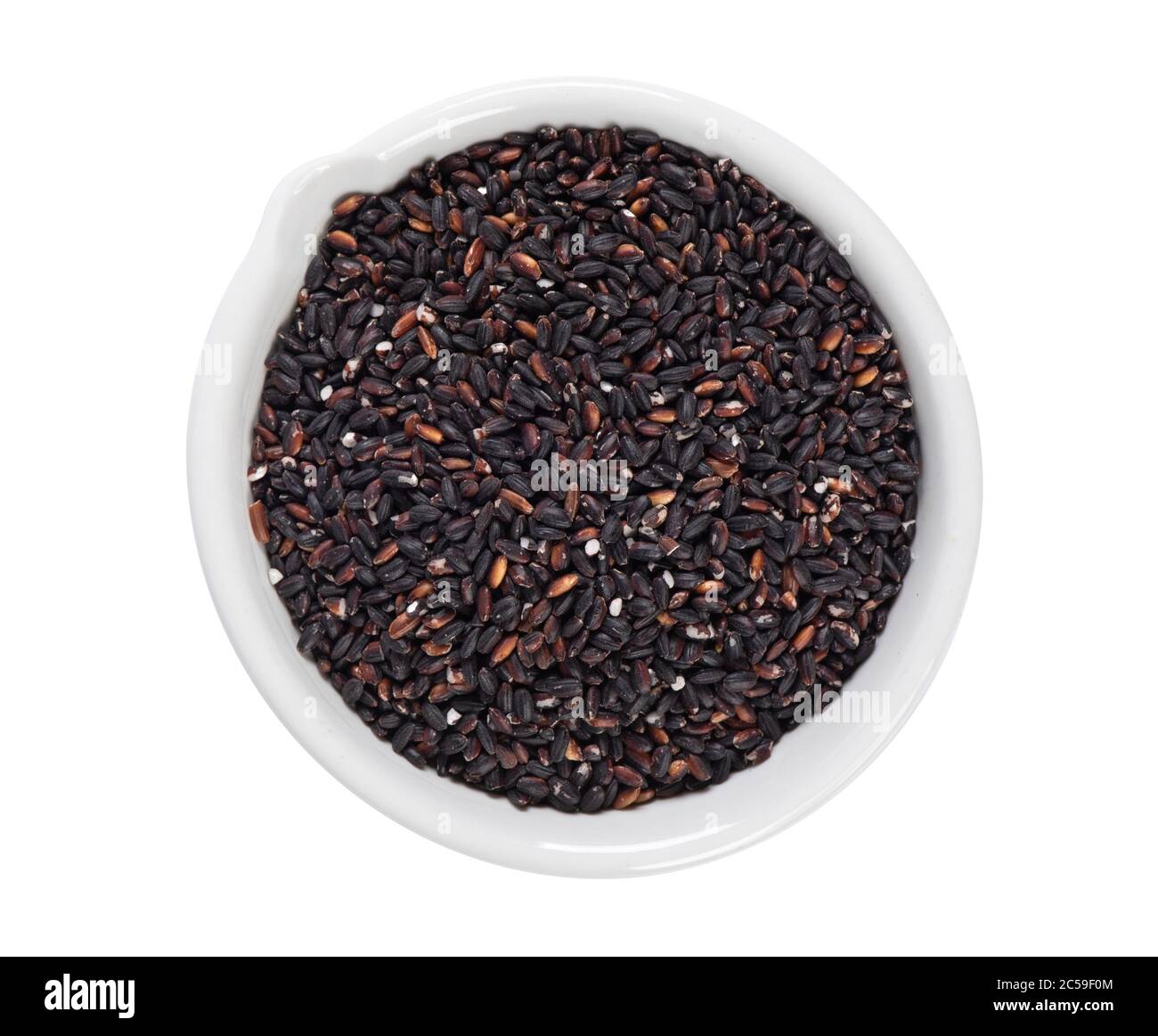 Raw wild black rice in ceramic bowl isolated on white with clipping ...