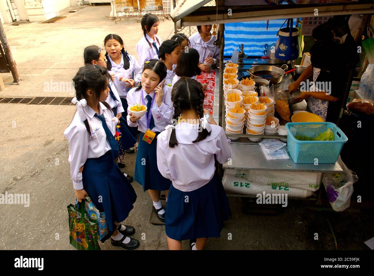 Thailand, Bangkok, student street food around stall Stock Photo - Alamy