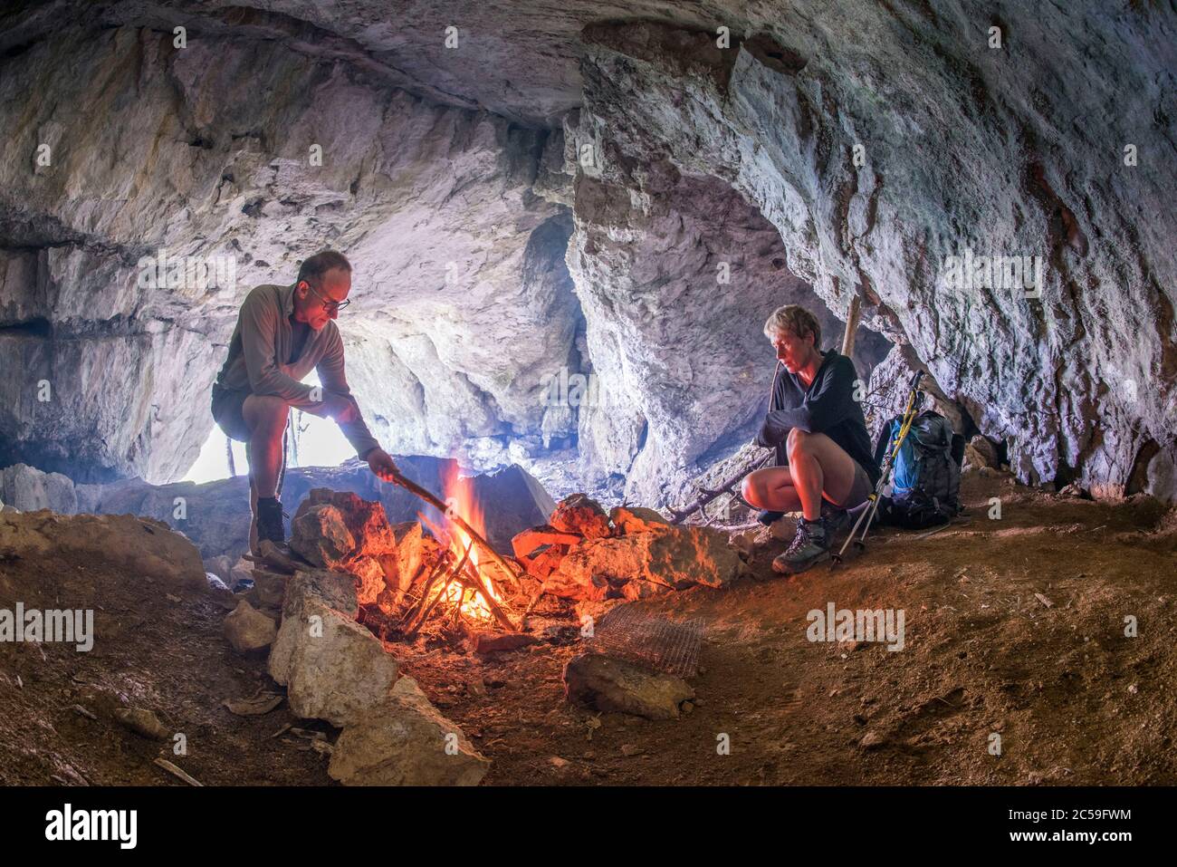 Couple Around A Campfire High Resolution Stock Photography and Images ...