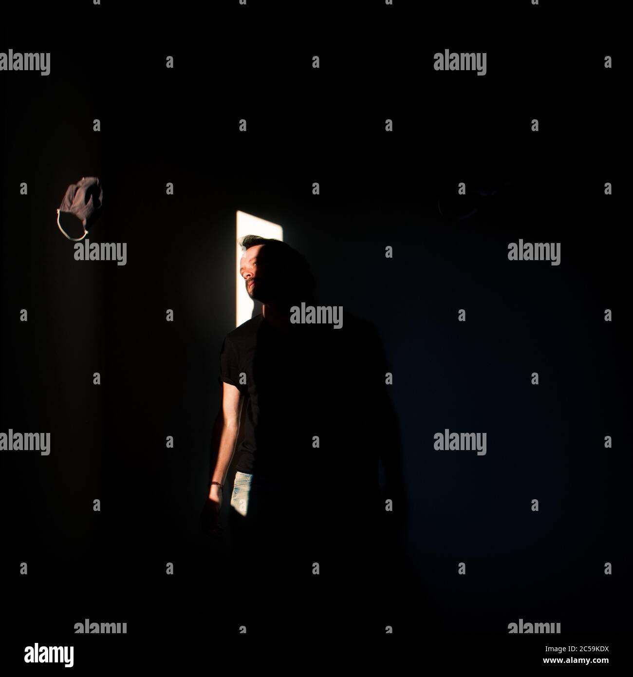 Beam of light in dark room hi-res stock photography and images - Alamy