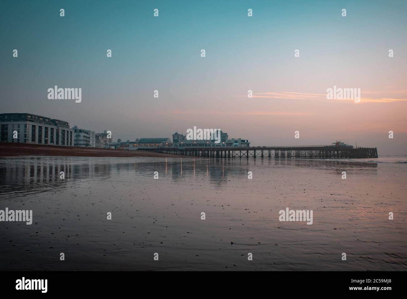 South parade pier in Southsea, Portsmouth, UK at sunrise and at low ...
