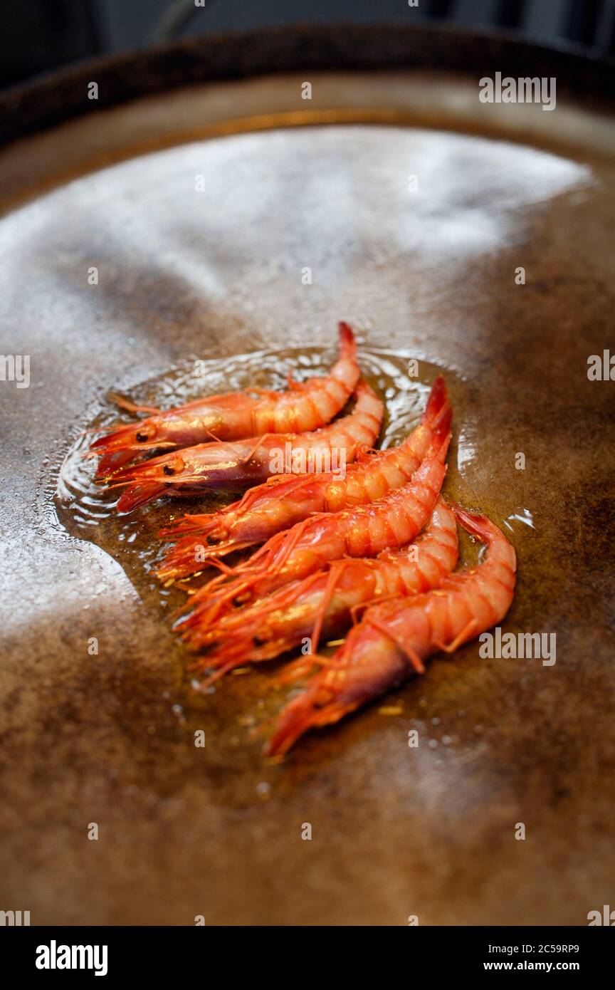Spain, Catalonia, Barcelona, ??coastal restaurant cooking prawns Stock ...
