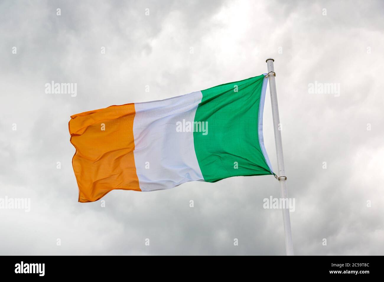 Irish flag waving in wind hi-res stock photography and images - Alamy