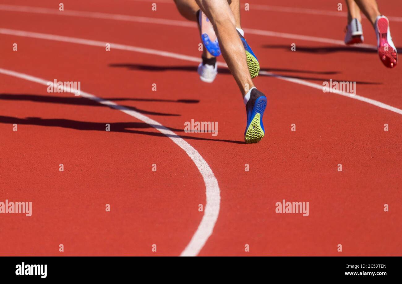 Athletics people running on the track field. Sports and healthy ...