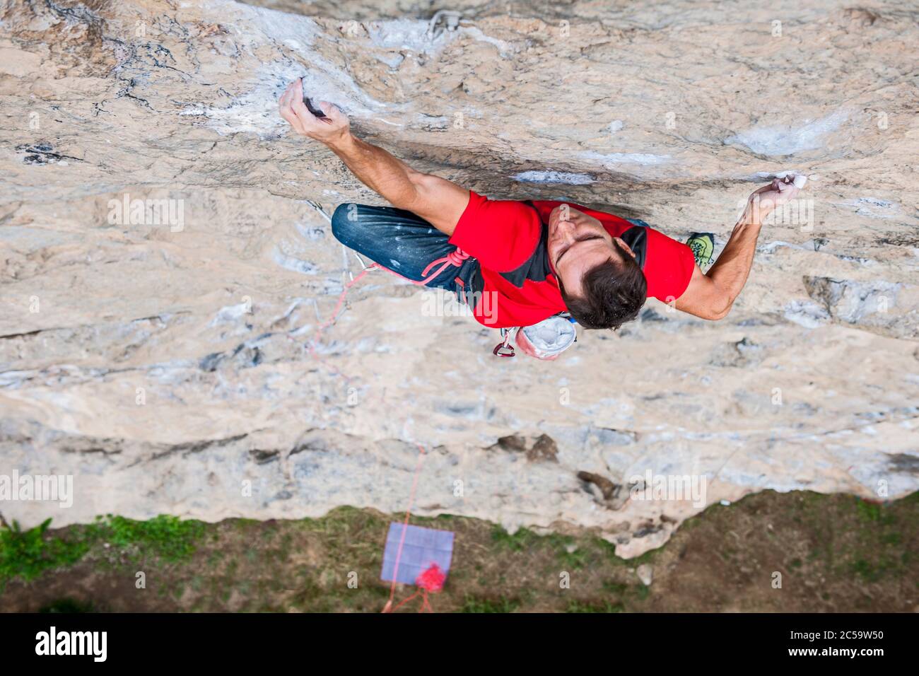 view from above of man climbing rock face in Yangshuo Stock Photo - Alamy