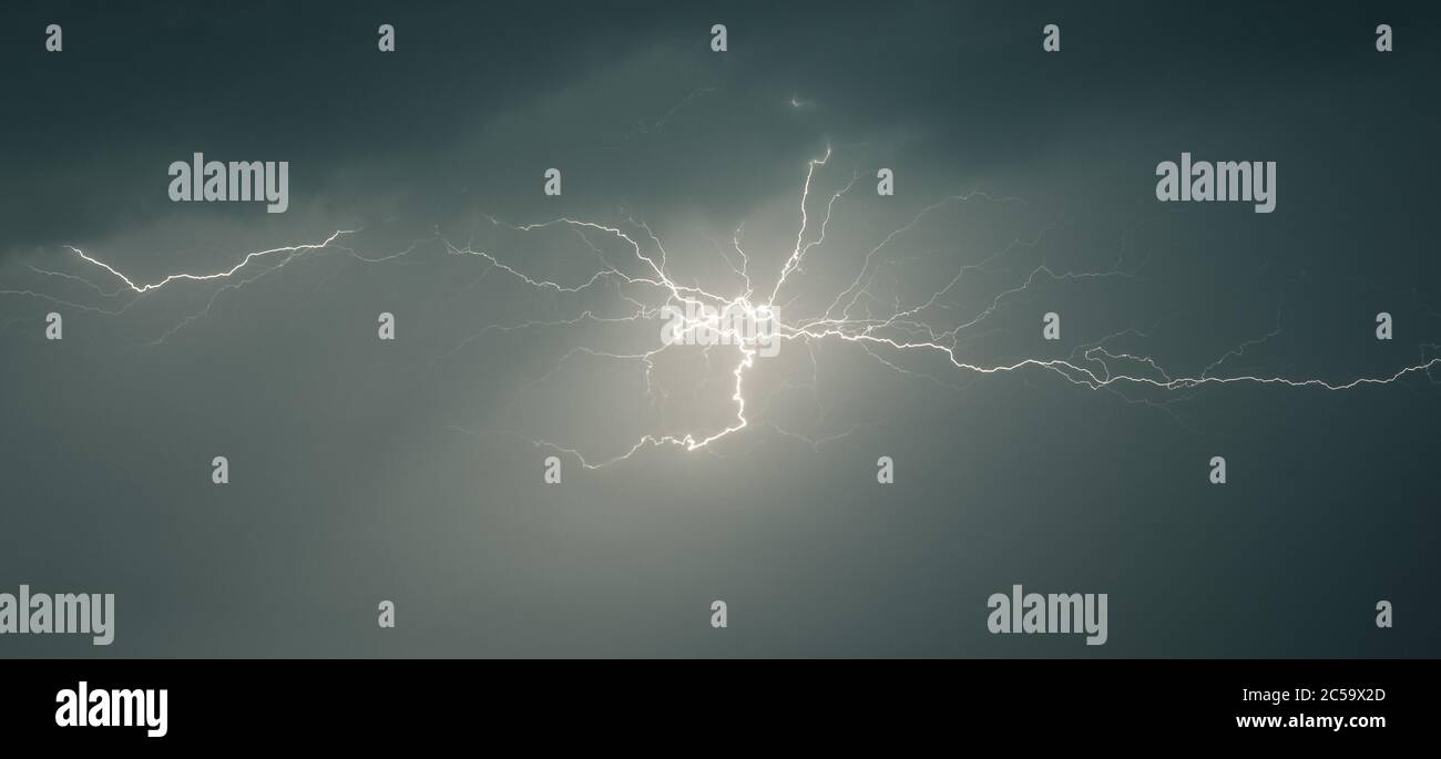 Fierce lightnings split through the air Stock Photo - Alamy
