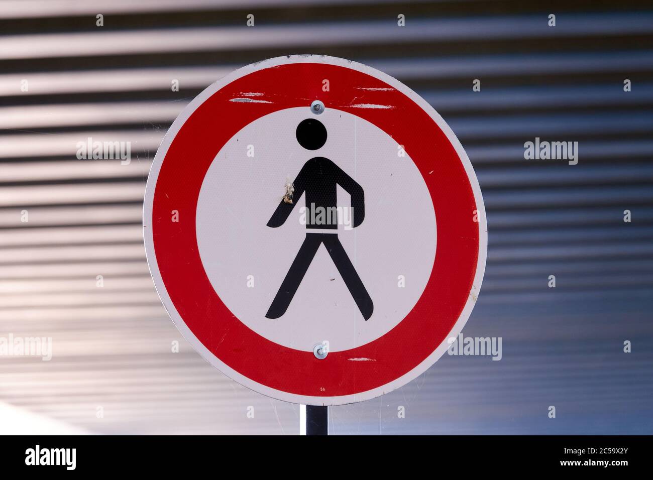 a roads sign meaning pedestrian may not go through this area Stock ...