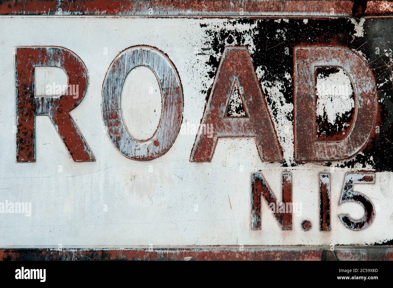 Old peeling road sign hi-res stock photography and images - Alamy