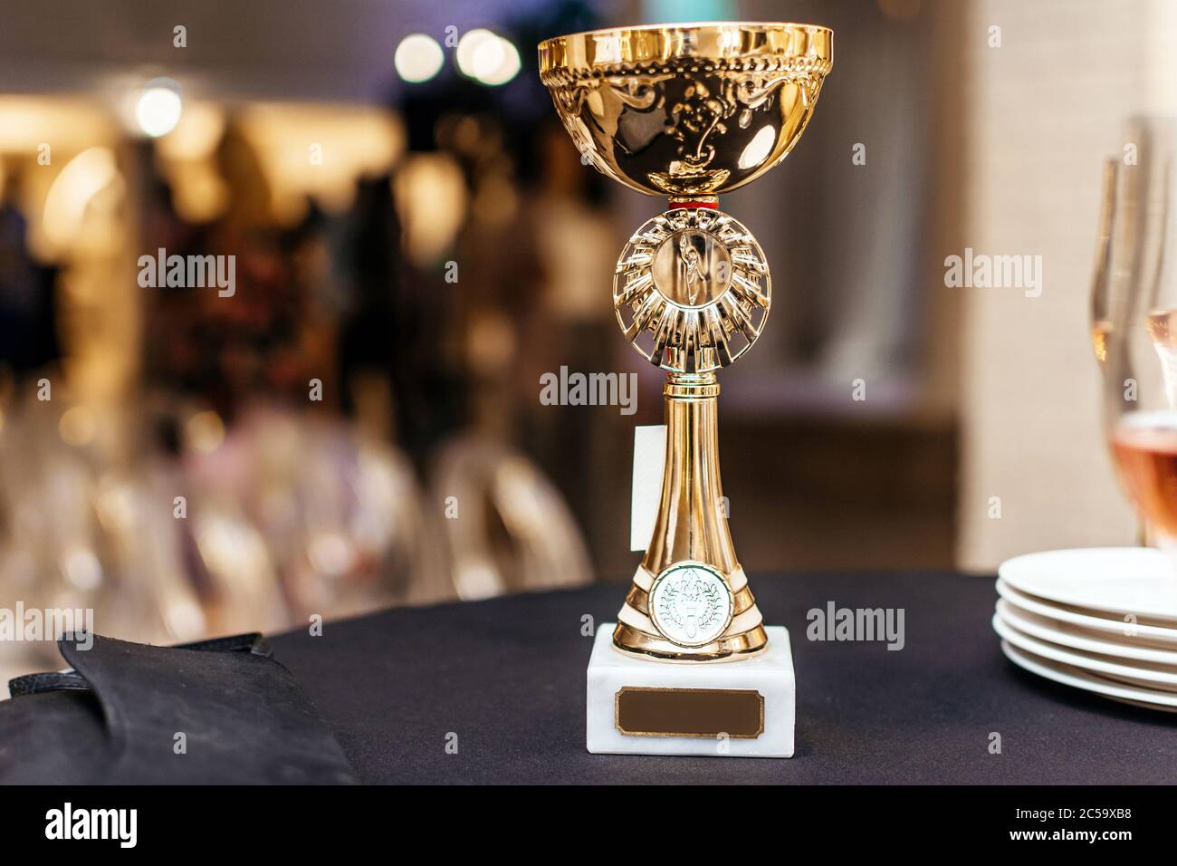 Trophy on table yellow hi-res stock photography and images - Alamy
