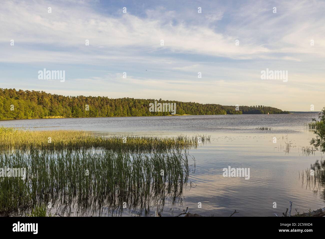 Beautiful lake view on blue sky with white clouds background. Beautiful ...