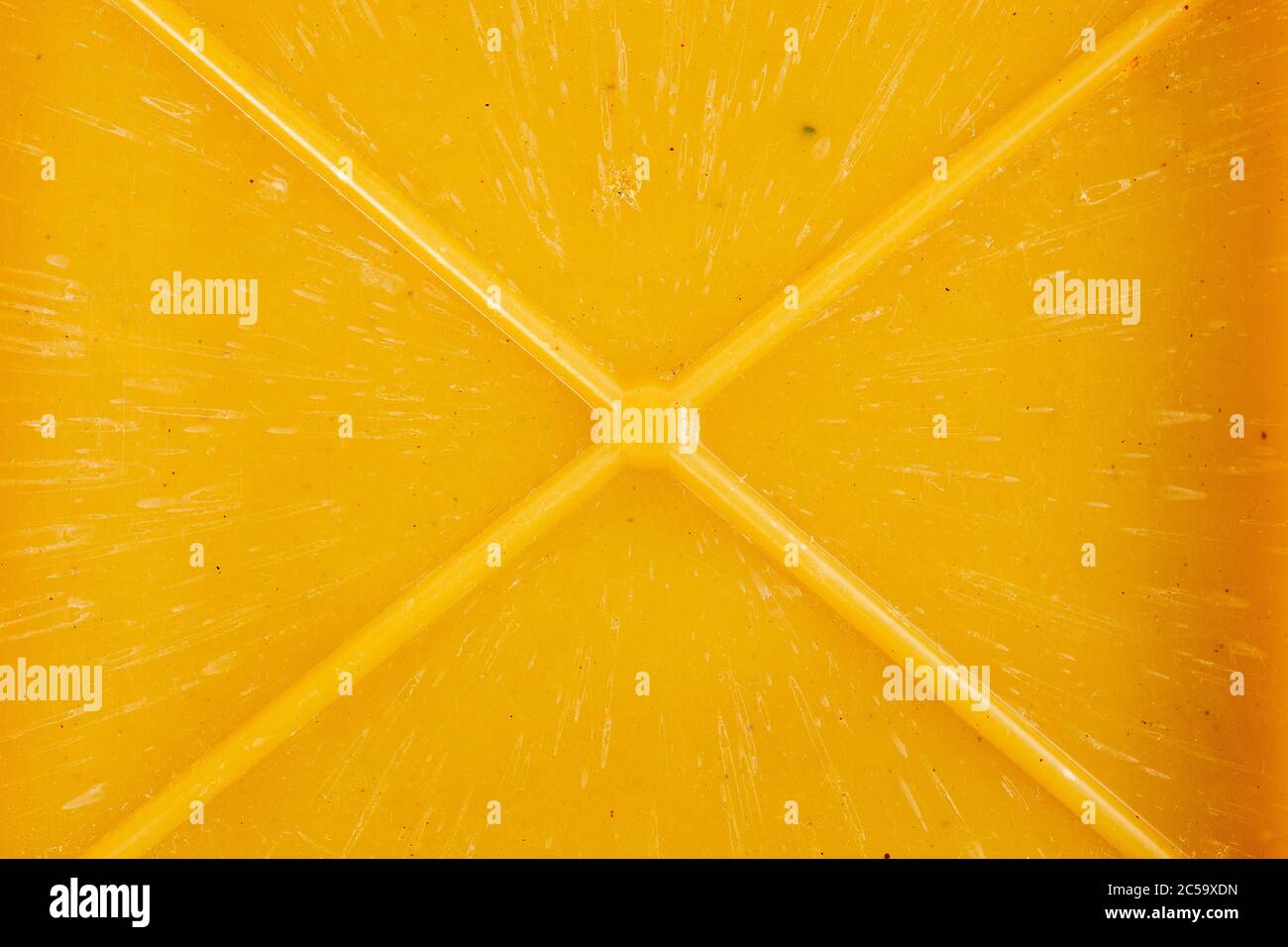 close-up texture and background of yellow bakelite or carbolite plastic ...