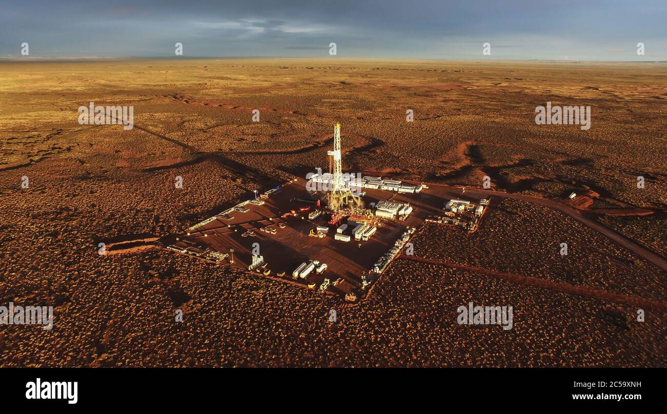 Aerial shot of hydraulic fracturing equipment on a brown field Stock ...