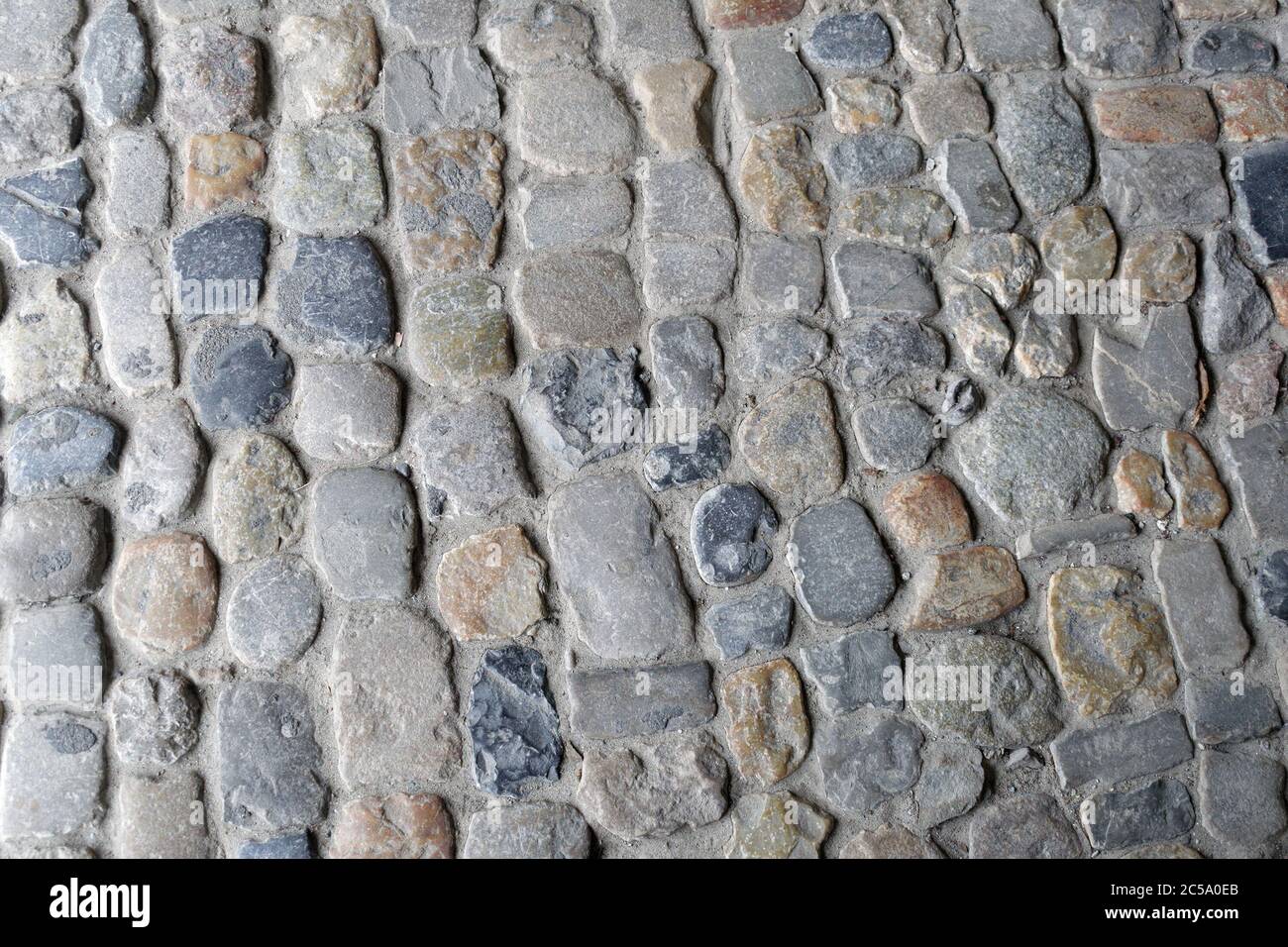 Cobblestone street surface texture Stock Photo - Alamy