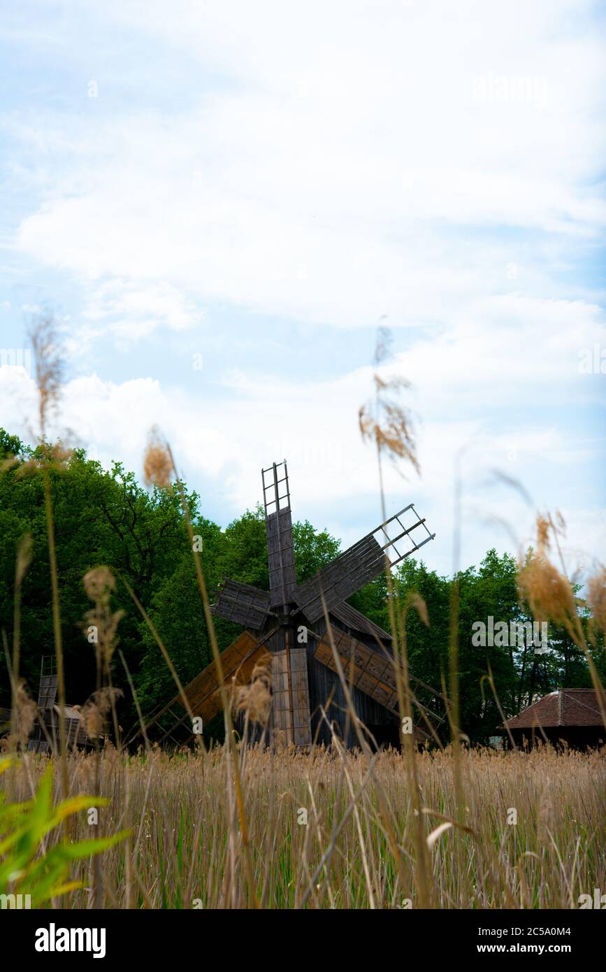 we admire the traditional windmills built of wood Stock Photo - Alamy