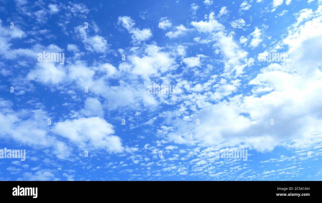 Low angle view of a blue cloudy sky at daytime - perfect for wallpapers ...